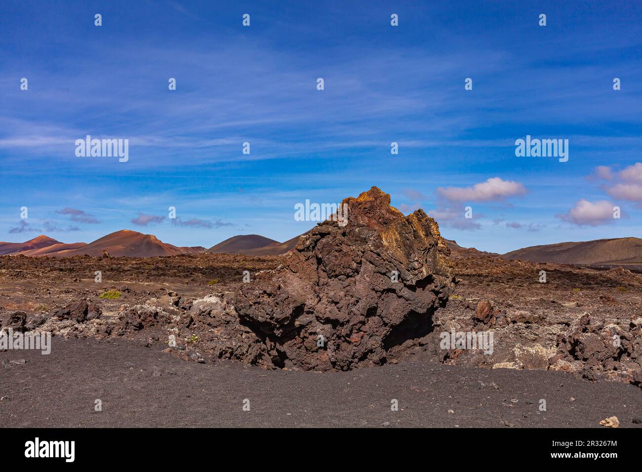 Lava of extinct volcano in valley on the Canary Island. Volcanic coast ...