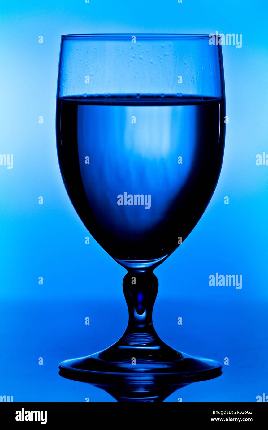 Blue water glass Stock Photo - Alamy