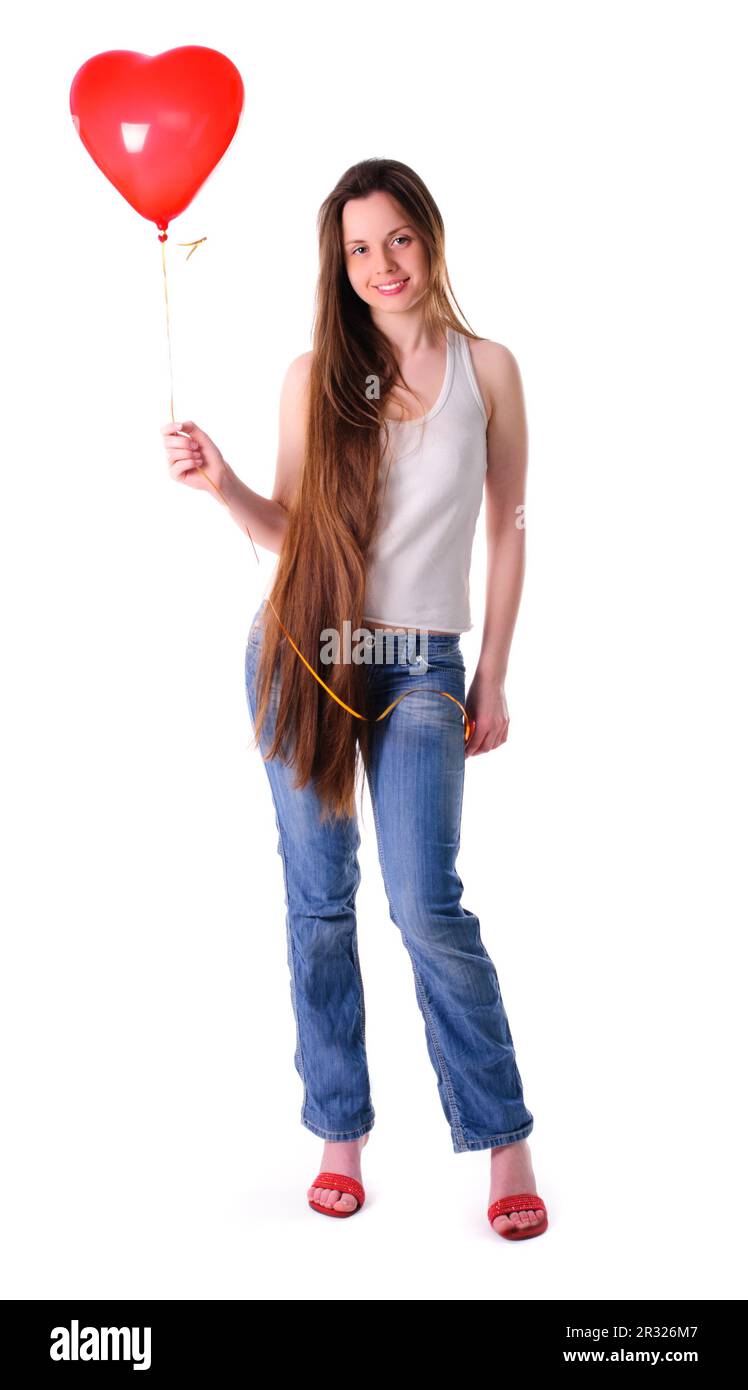 Girl with red balloon heart Stock Photo - Alamy