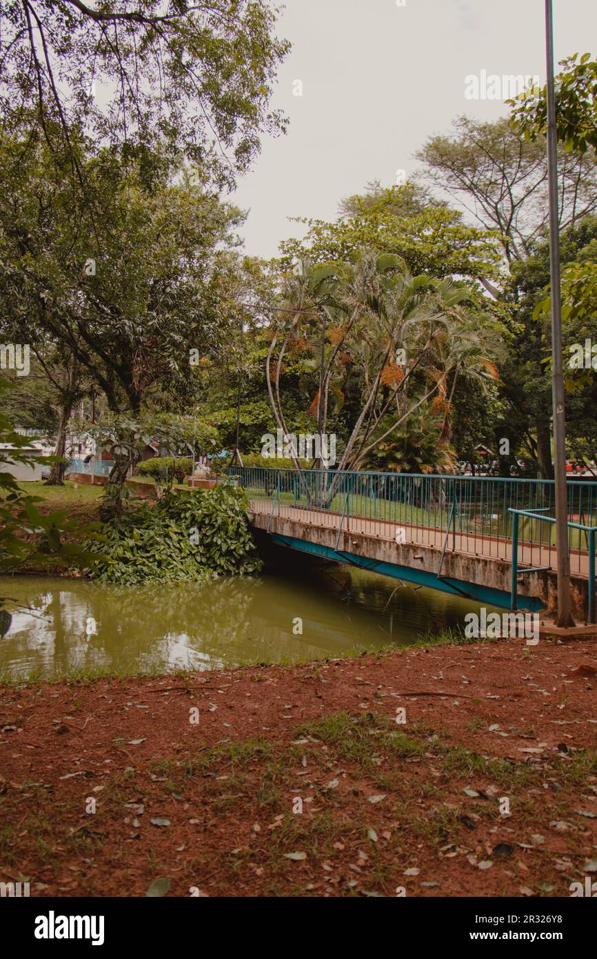 rustic bridge in the middle of the square Stock Photo - Alamy