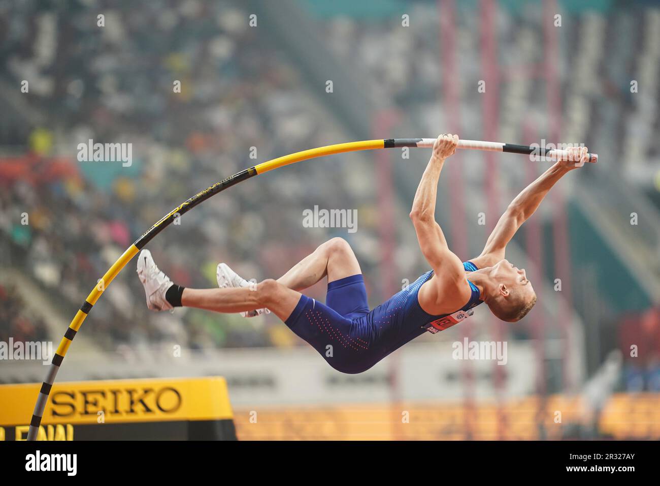 Sam Kendricks participating in the pole vault at the Doha 2019 World ...