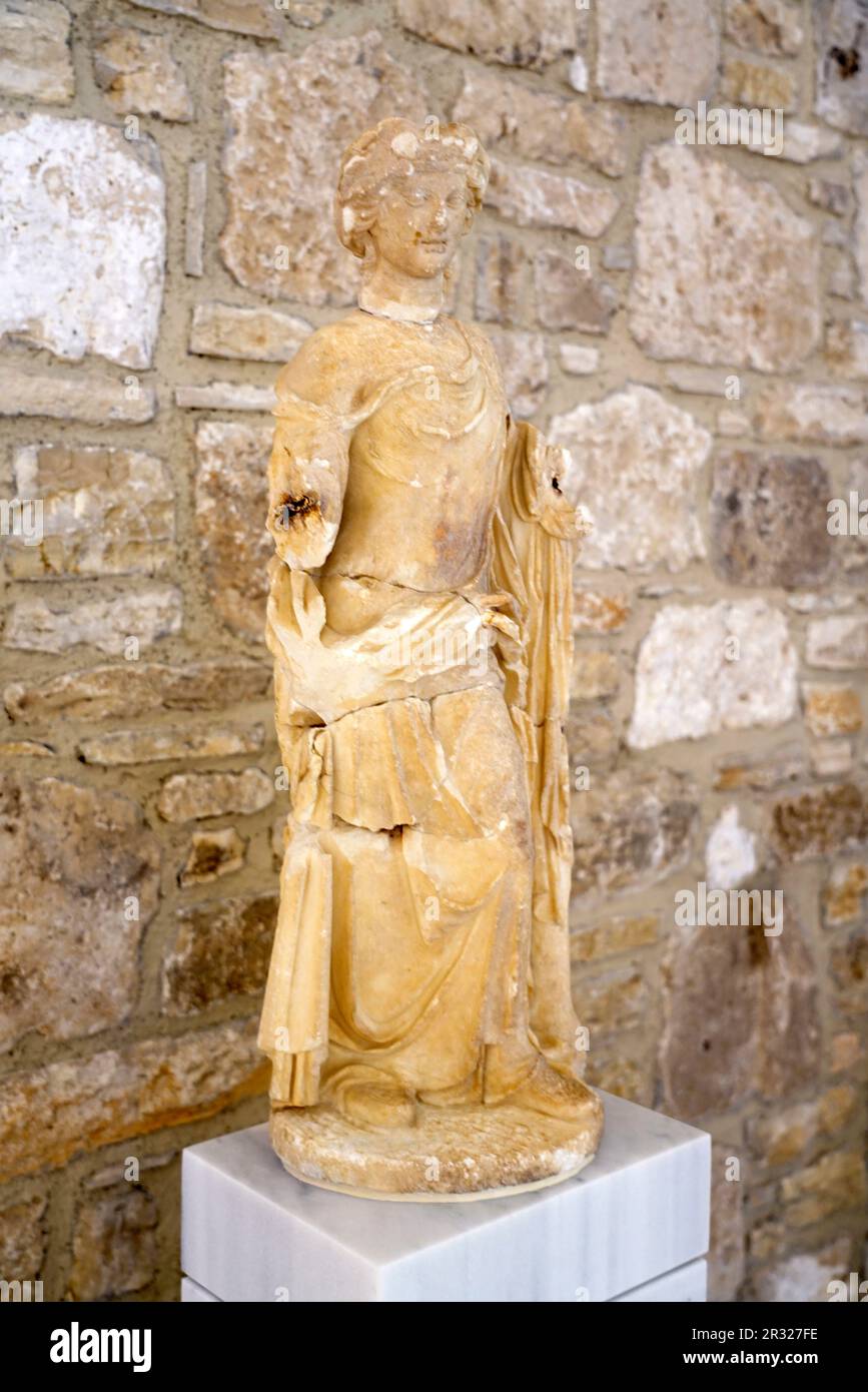 Statue of Dionysus dressed in chiton and imation, Archaeological Museum ...