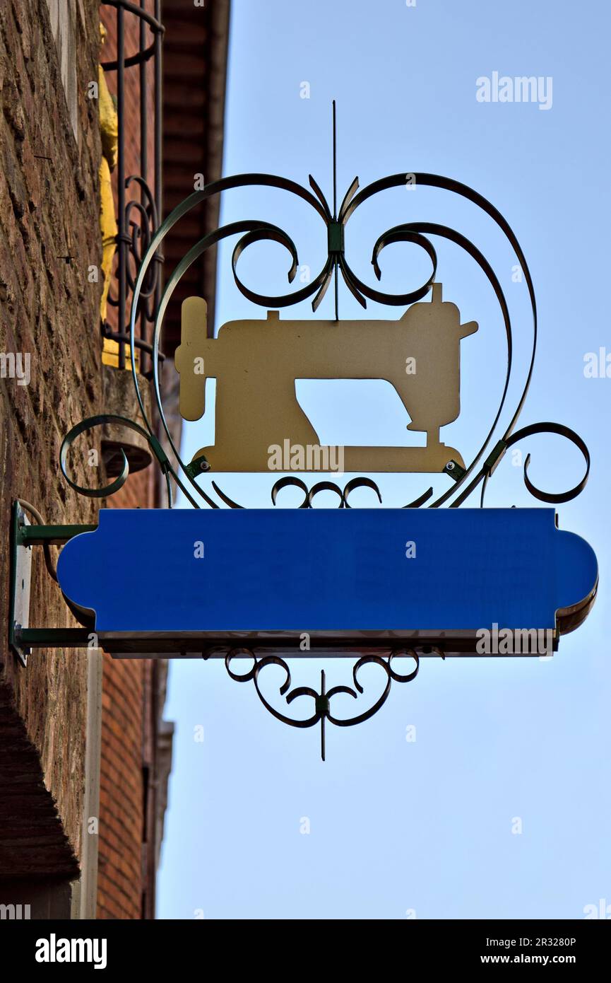Guild sign tailor Stock Photo - Alamy
