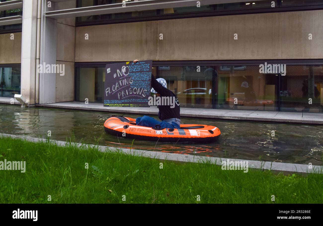 London, UK. 22nd May 2023. An activist from the pro-refugee ...