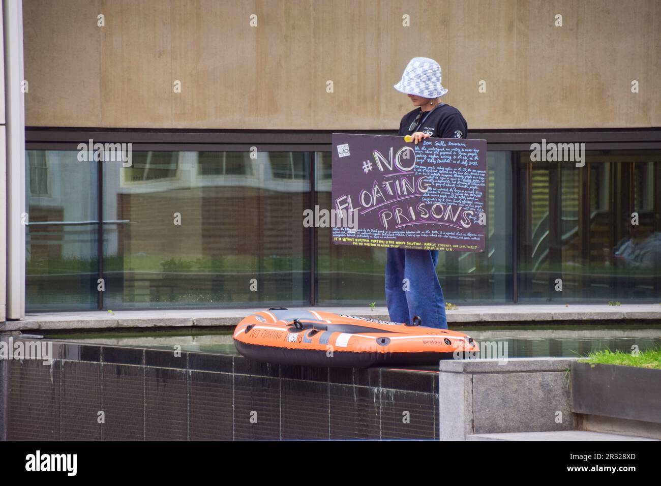 London, UK. 22nd May 2023. An activist from the pro-refugee ...