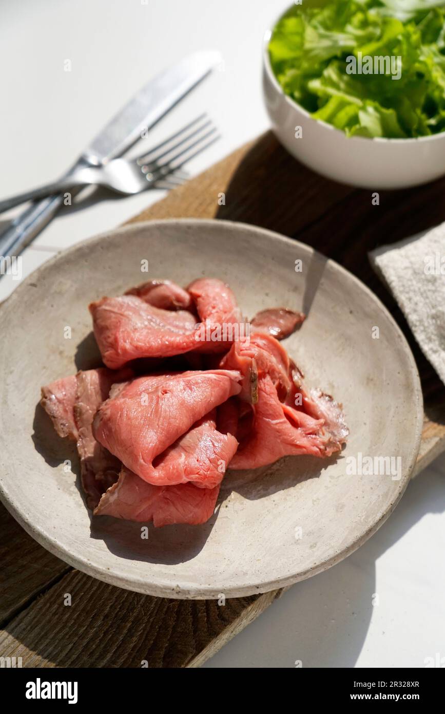 Roast beef, lean beef roasted rare, to be served in slices, Milan ...