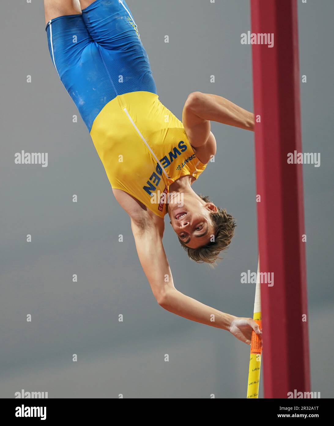 Armand Duplantis participating in the pole vault at the Doha 2019 World ...
