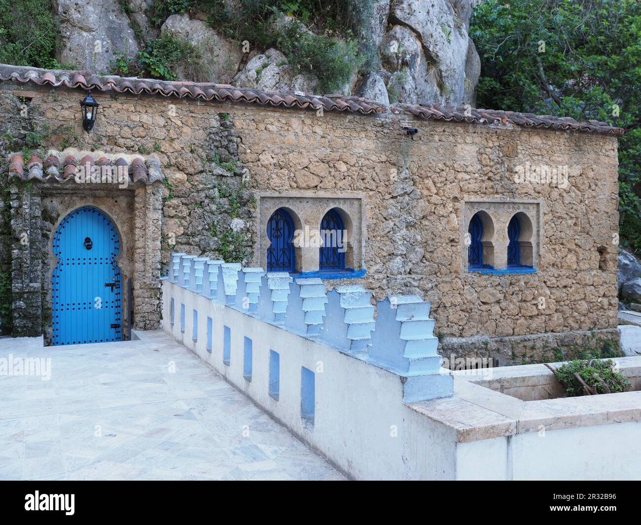 Entrance and white bridge over Ras El Maa waterfall in african ...