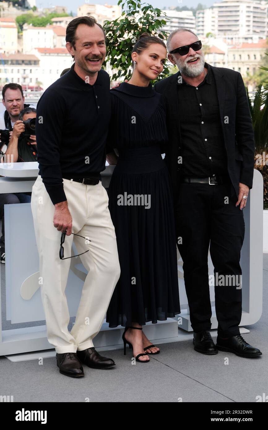 Cannes, France. 22nd May, 2023. Jude Law, Alicia Vikander and Karim ...