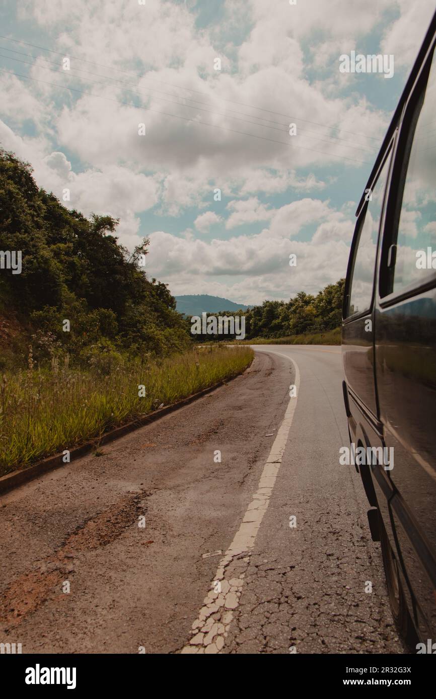 rear view of car on asphalt road in countryside Stock Photo - Alamy
