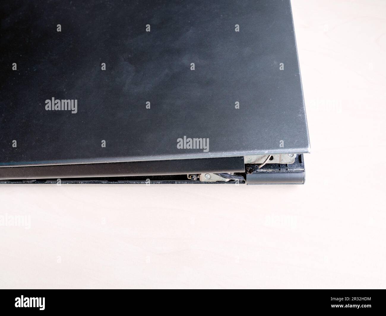 burnt and frayed electrical power wire of matrix of old laptop on the ...