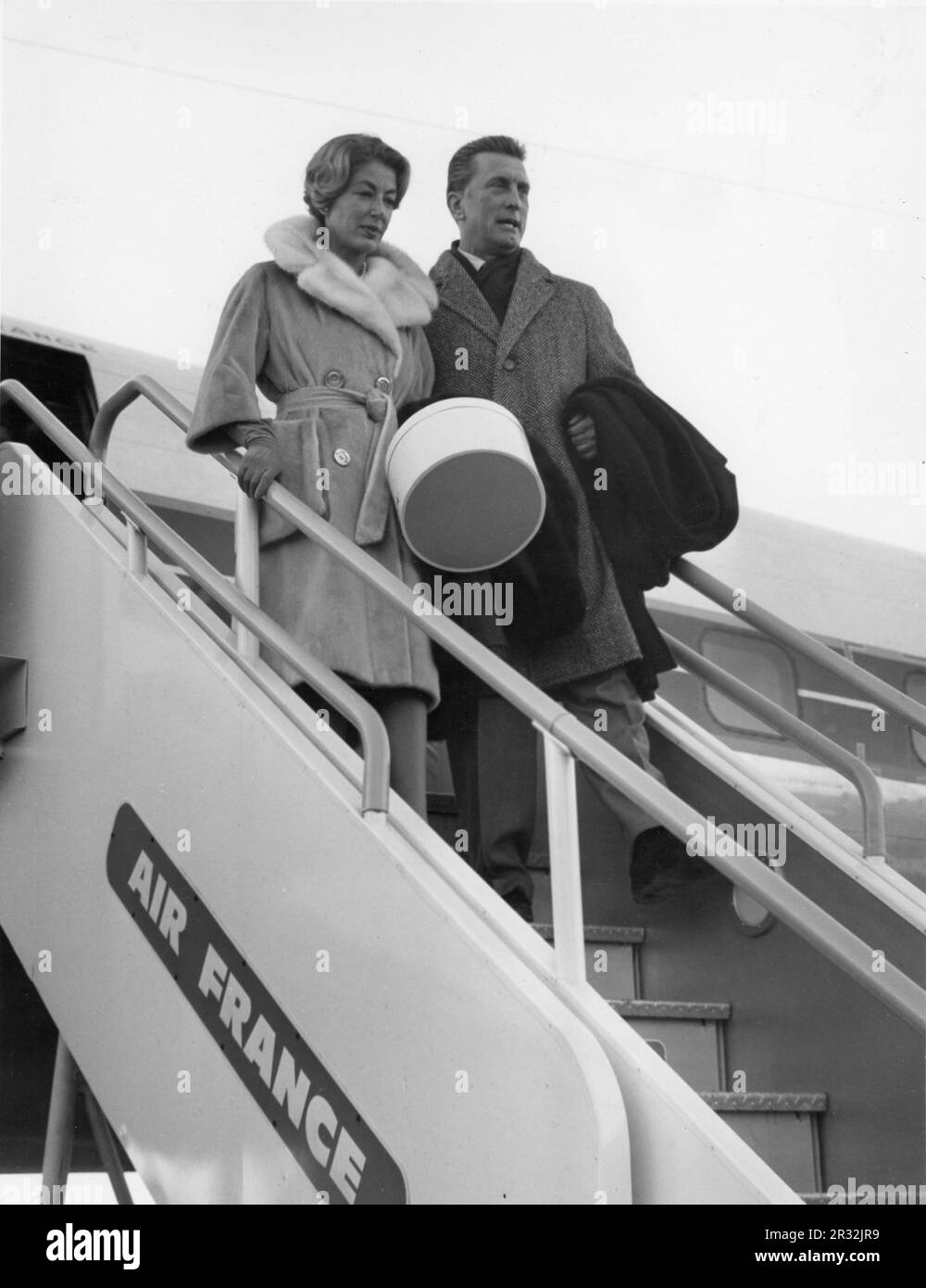 KIRK DOUGLAS and his second wife ANNE DOUGLAS arriving on Air France ...