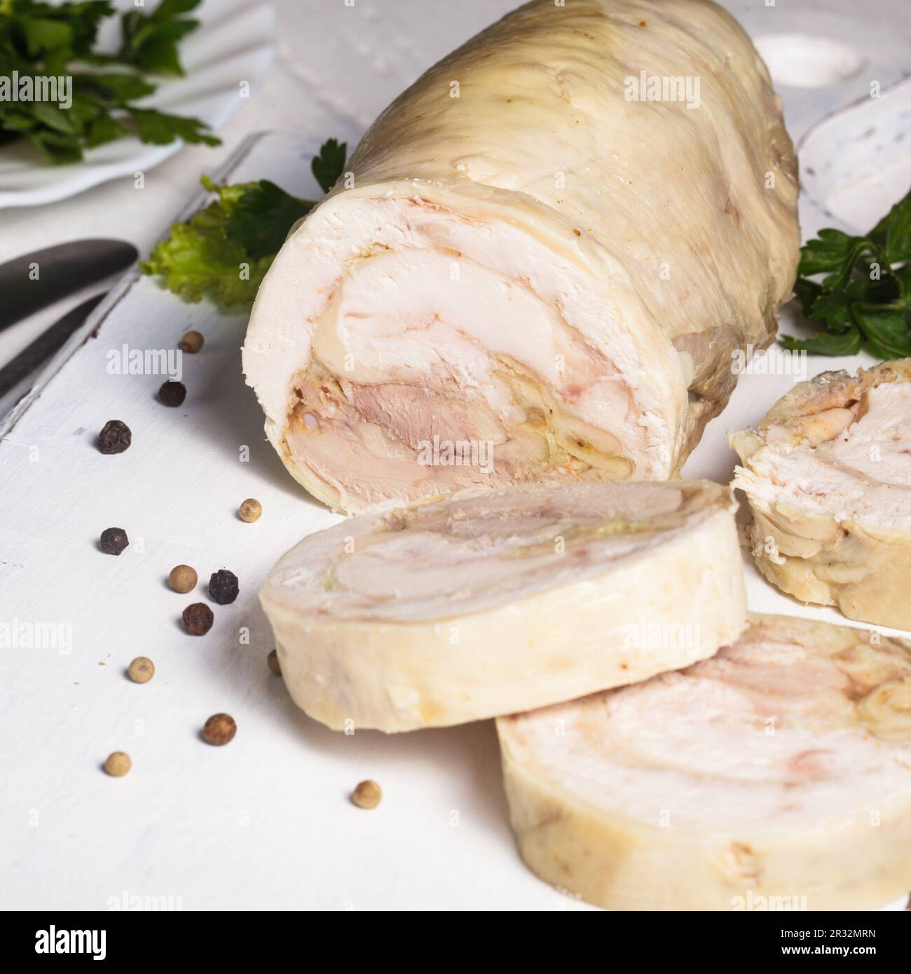 A baked chicken roll Stock Photo - Alamy