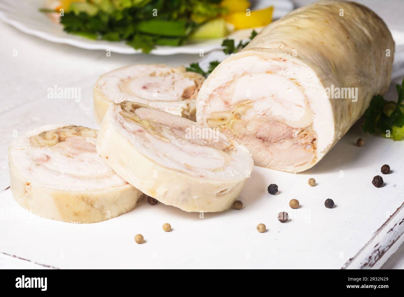 A baked chicken roll Stock Photo - Alamy