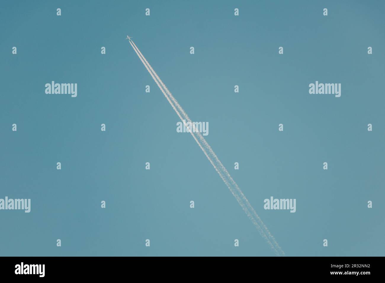 long airplane trail in the sky Stock Photo - Alamy