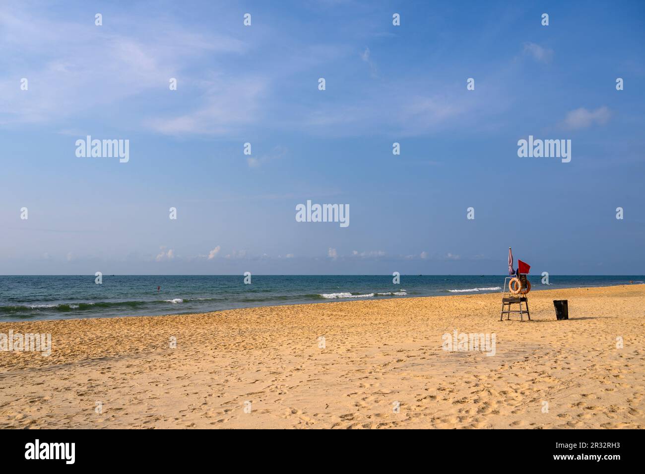 Beach Scene With Empty Lifeguards Chair On Deserted Beach Early