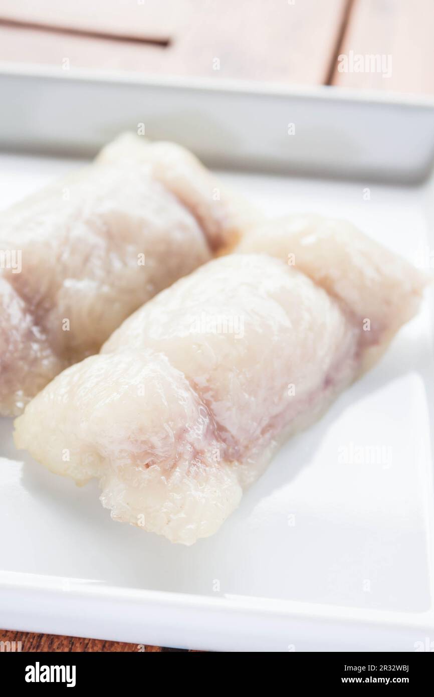 Bunch of mush with banana filling dessert Stock Photo - Alamy