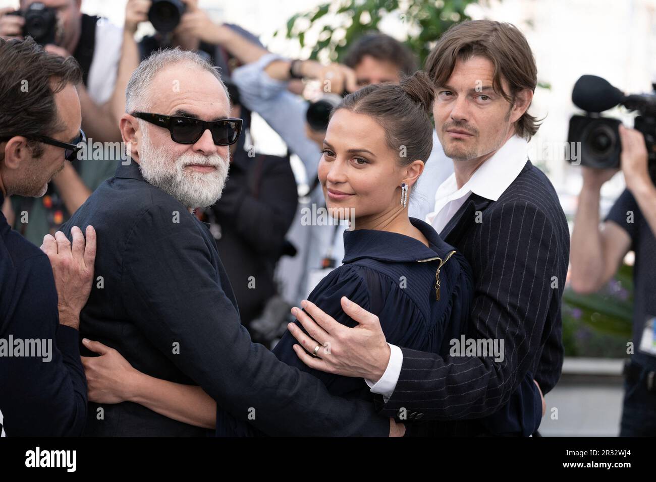 Cannes, France. 22nd May, 2023. Jude Law, Karim Ainouz, Alicia Vikander ...