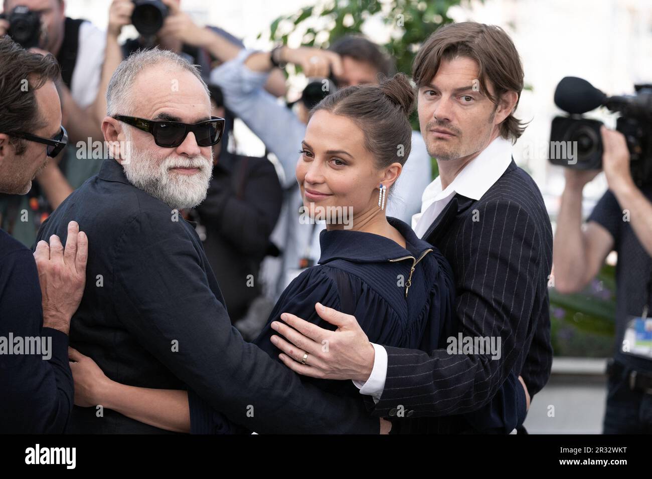 Cannes, France. 22nd May, 2023. Jude Law, Karim Ainouz, Alicia Vikander ...