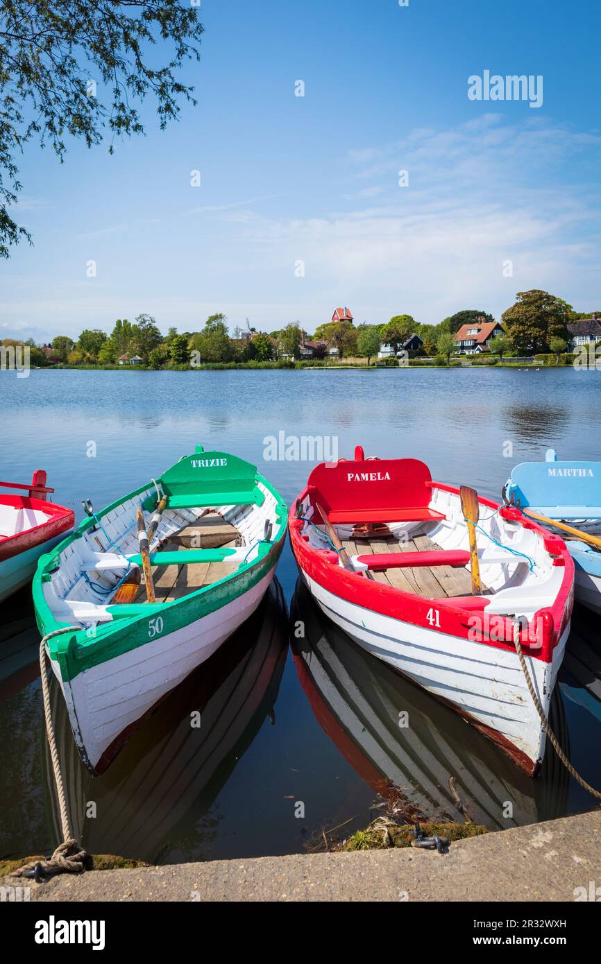 Bright and Colourful Rowing Boats on The Meare at Thorpeness in East ...