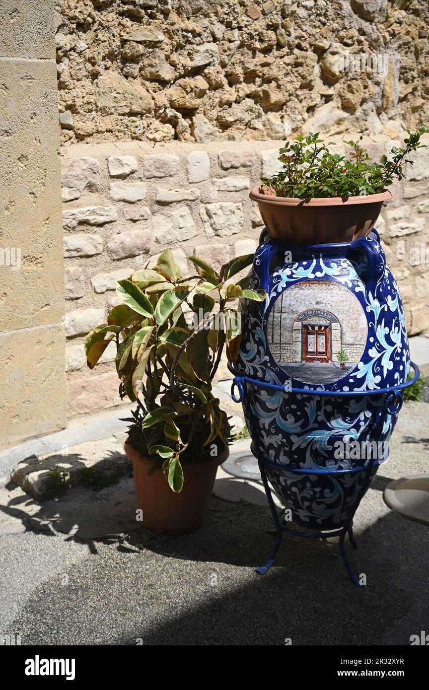 Traditional colorful hand painted Majolica glazed ceramic pots with ...