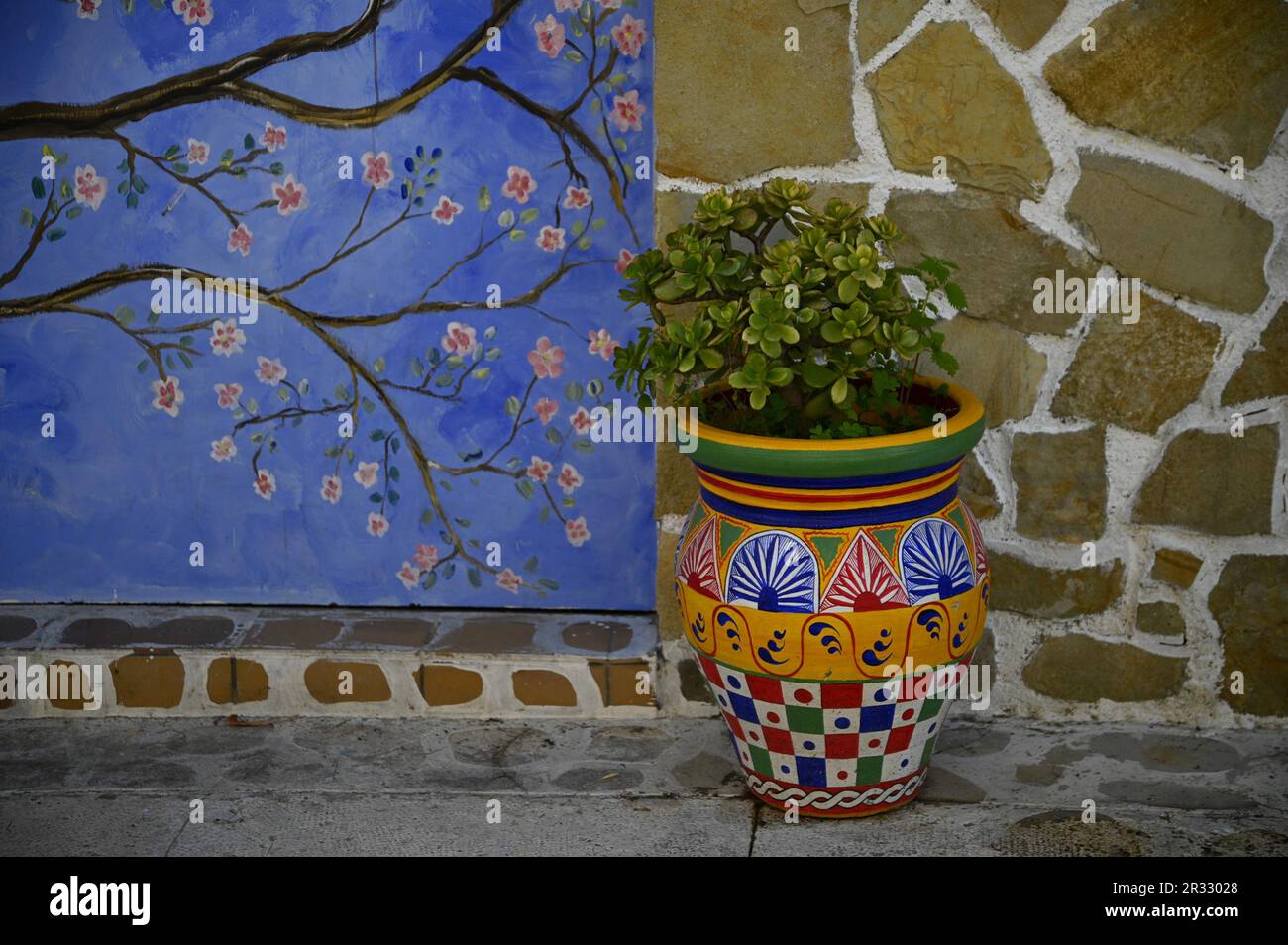 Traditional colorful hand painted Majolica glazed ceramic pots with ...
