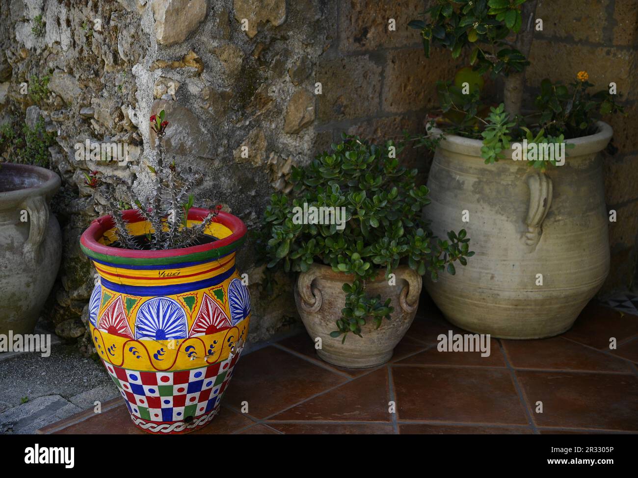Traditional colorful hand painted Majolica glazed ceramic pots with ...