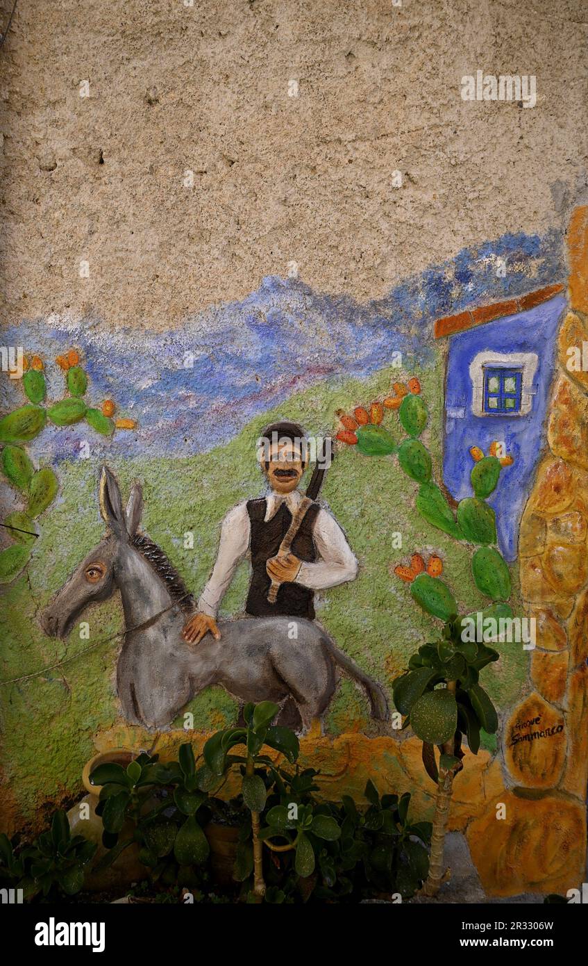 Local rural shop exterior wall with a hand painted mural in Borgo dei ...