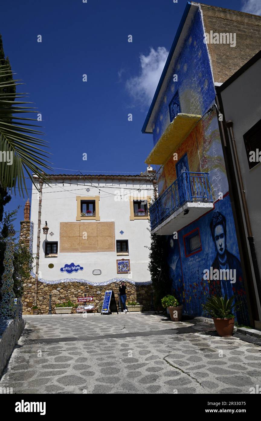 Young girl talking on her cell phone on the main square with the famous ...