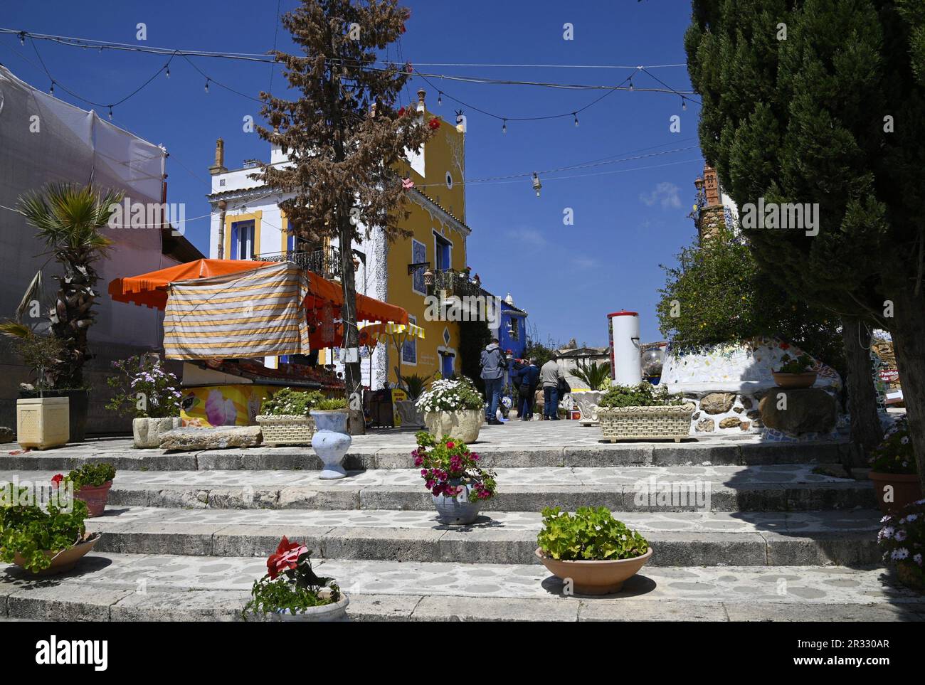 Traditional rural buildings on the main square of Borgo dei Parrini in ...