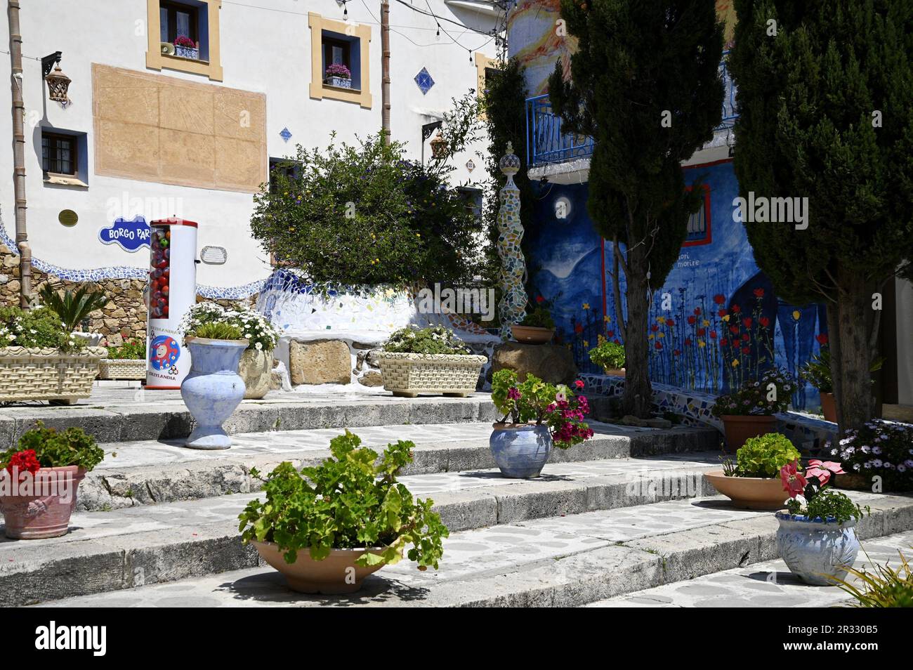 Traditional rural buildings on the main square of Borgo dei Parrini in ...
