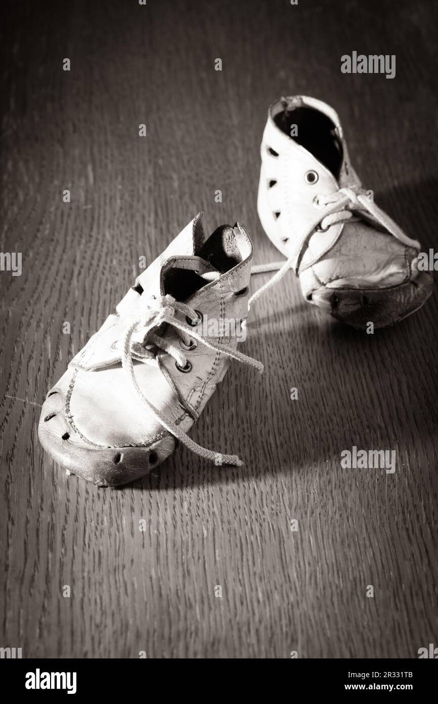 Old shoes old antique baby hi-res stock photography and images - Alamy