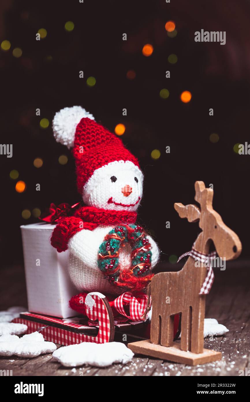 Snowman on sleigh hi-res stock photography and images - Alamy