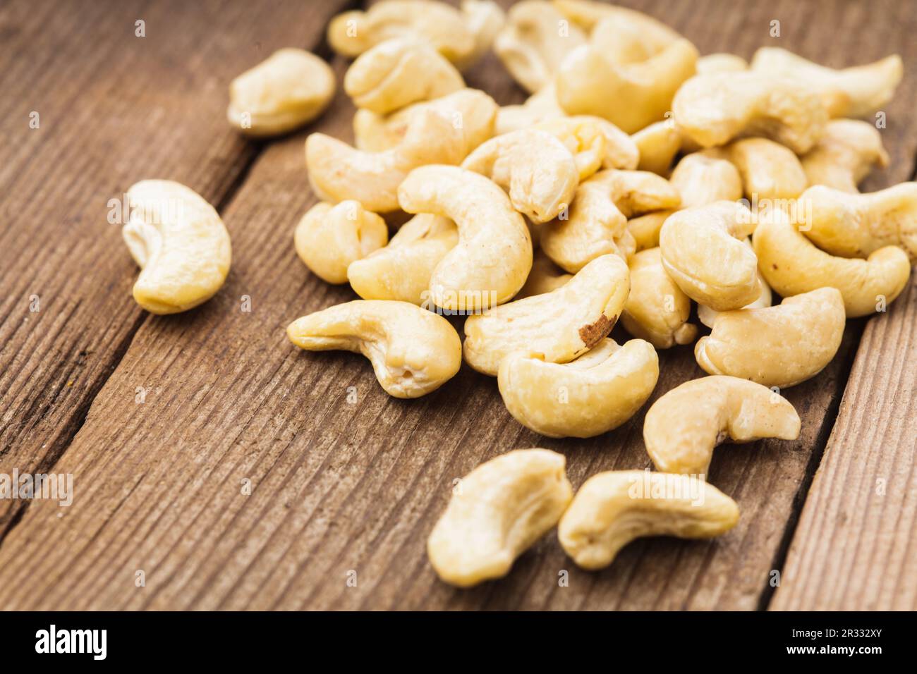 Cashews in wooden bowl Stock Photo - Alamy