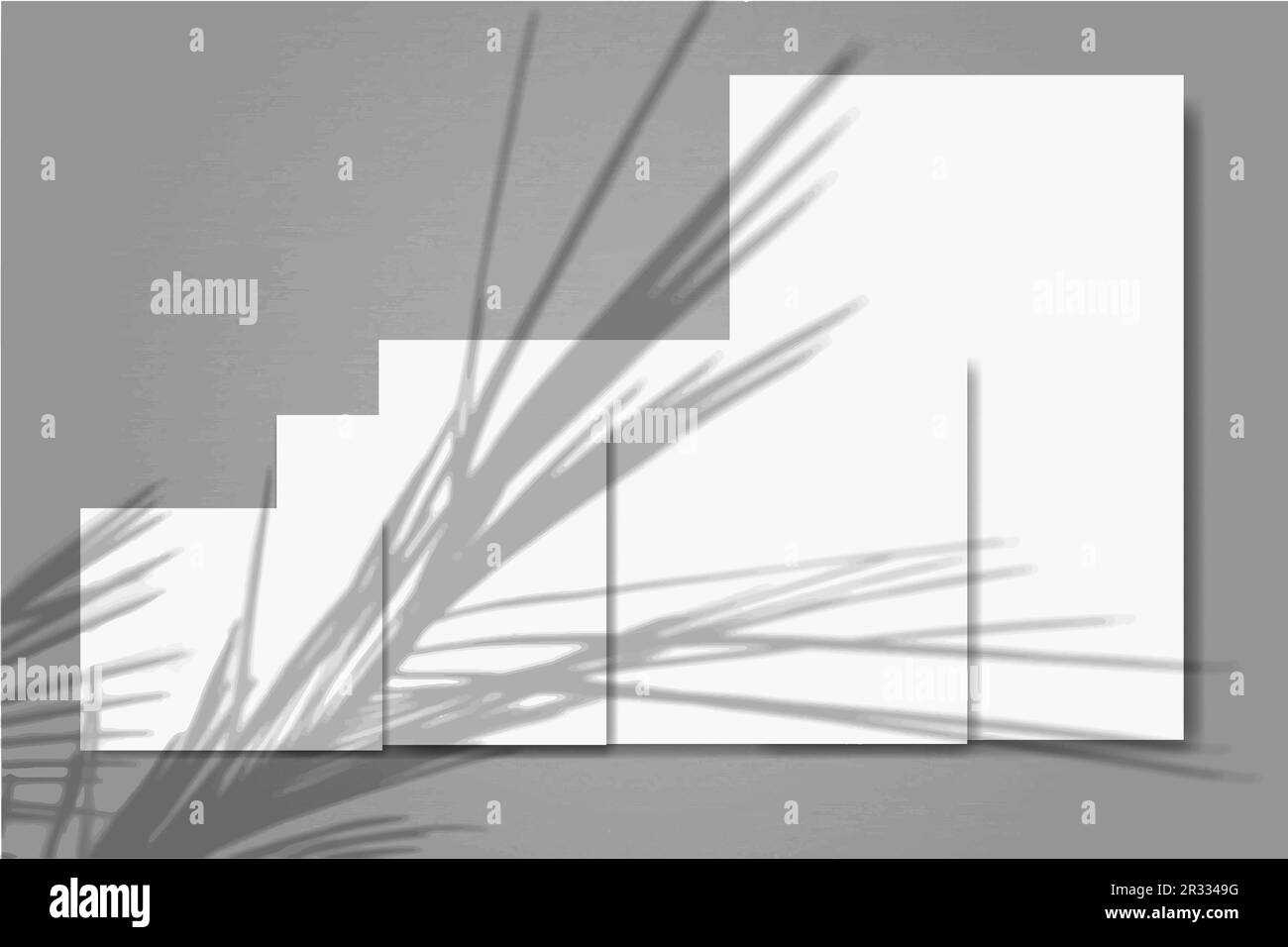 Several horizontal and vertical sheets of white paper against a grey ...