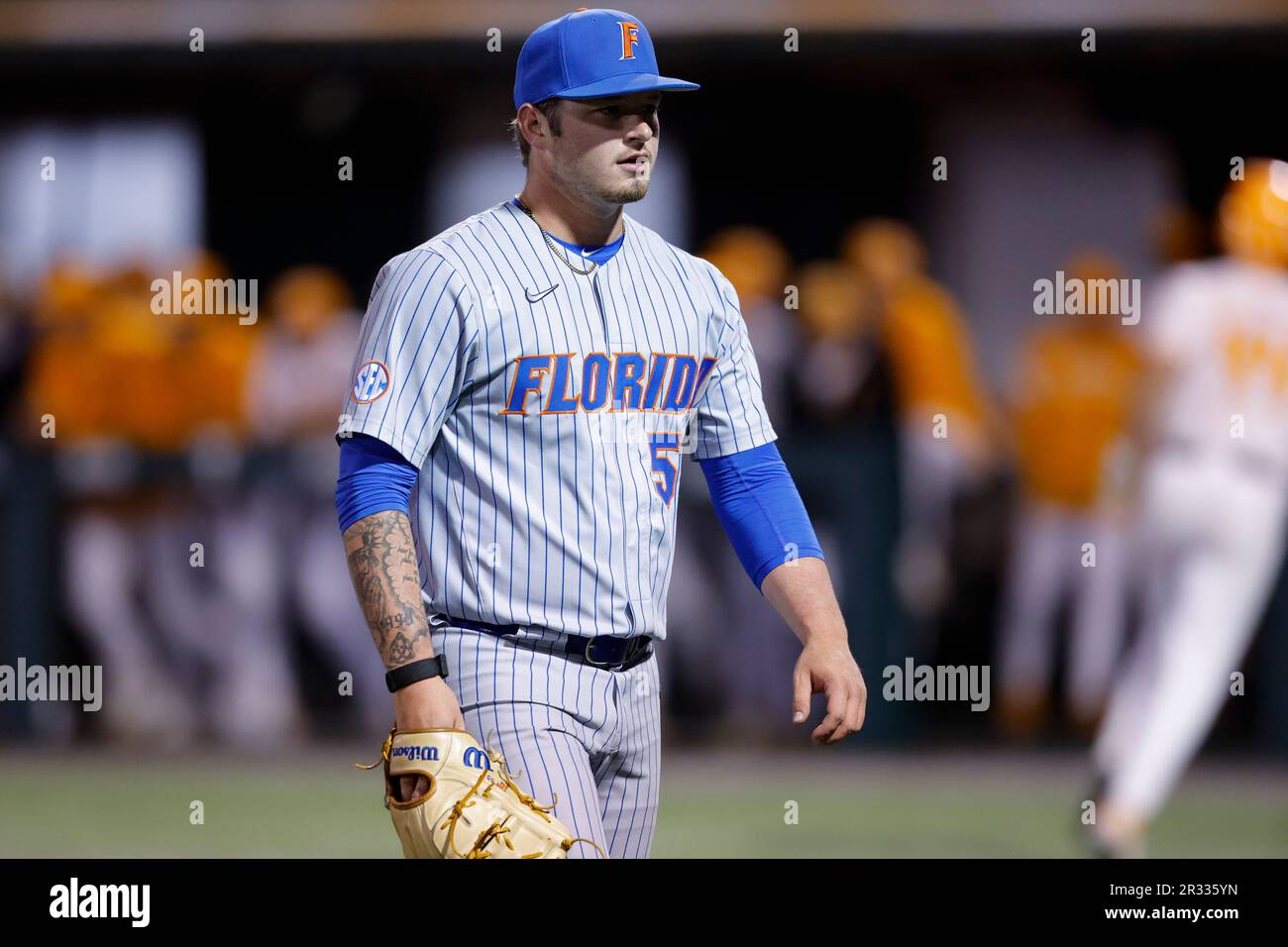 Florida Gators relief pitcher Philip Abner (55) walks to the dugout ...