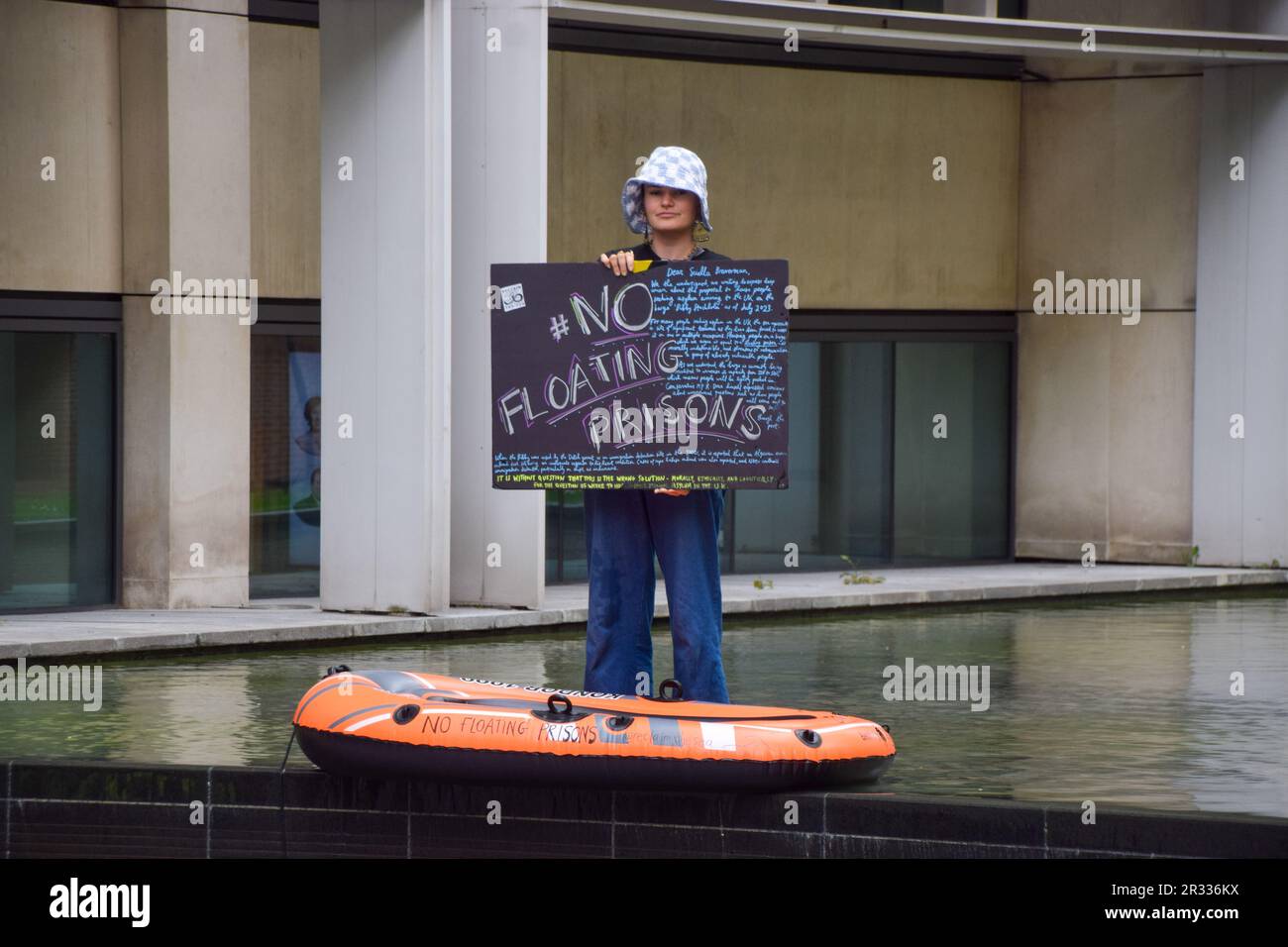 London, UK. 22nd May 2023. An activist from the pro-refugee ...