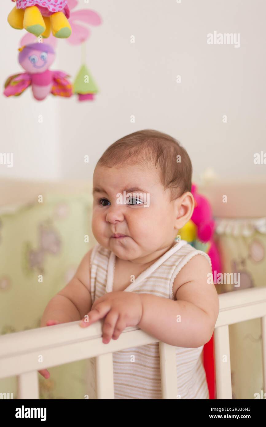 Baby stay in the bed Stock Photo - Alamy