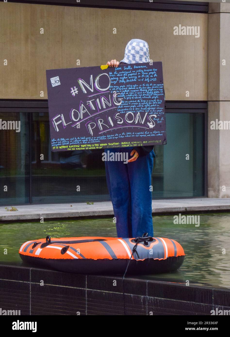 London, UK. 22nd May 2023. An activist from the pro-refugee ...