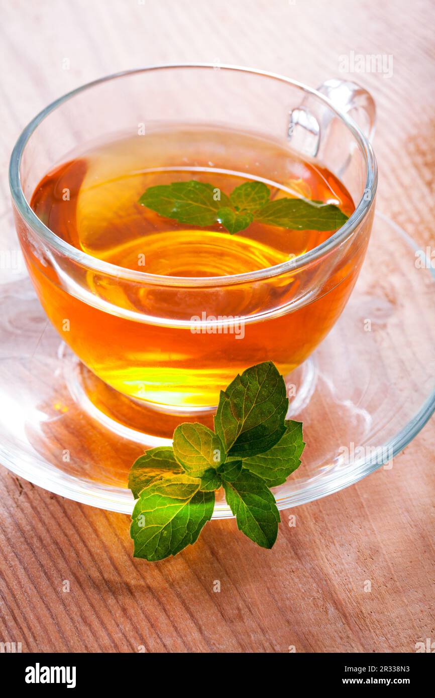 Tea cup with mint Stock Photo - Alamy