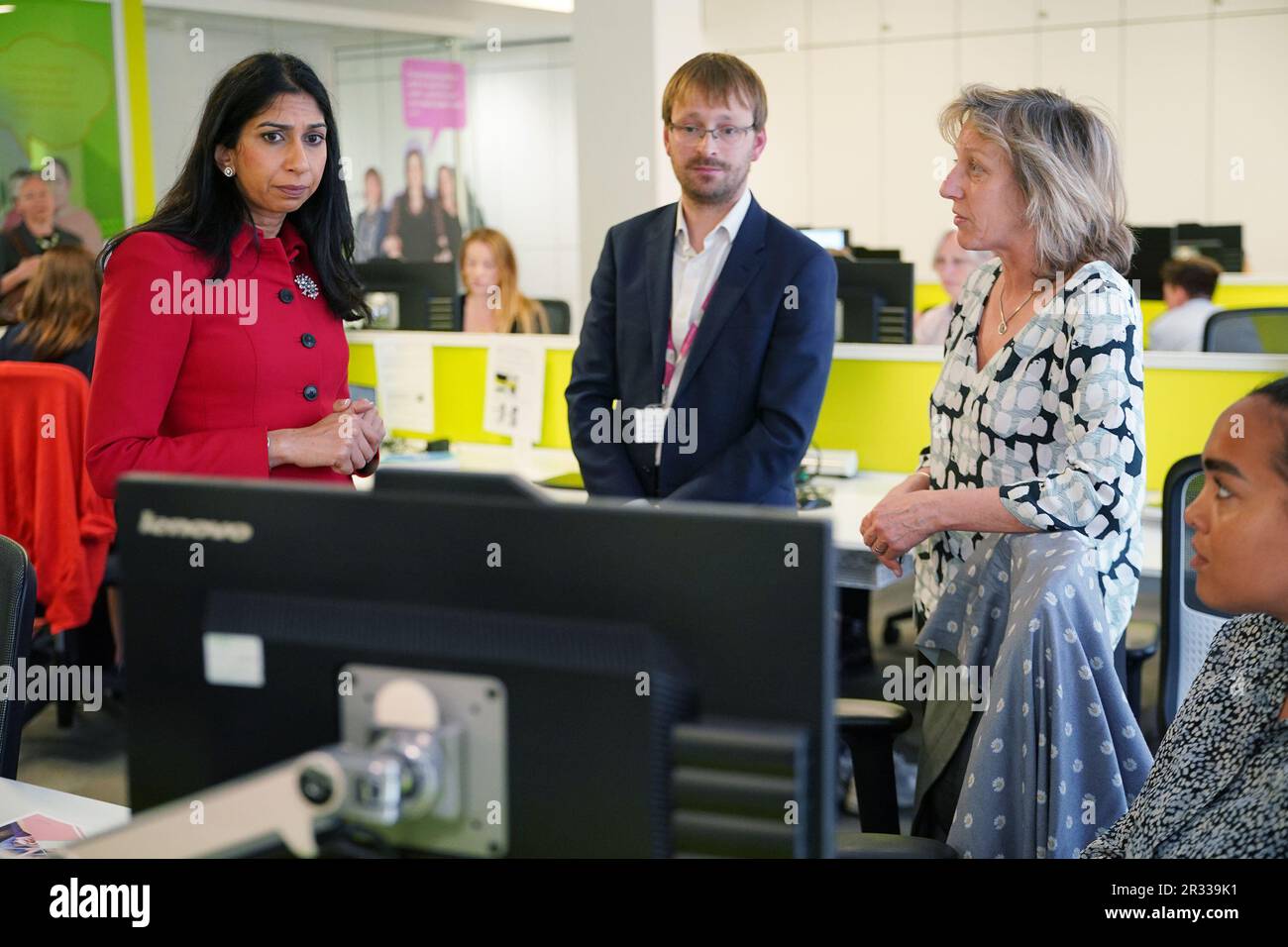 Home Secretary Suella Braverman (left) meeting staff during her visit ...