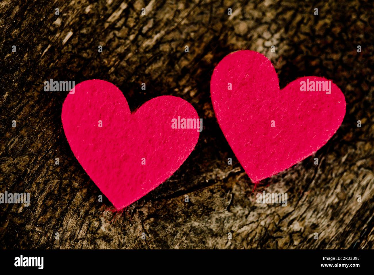 Two red hearts cut hi-res stock photography and images - Alamy