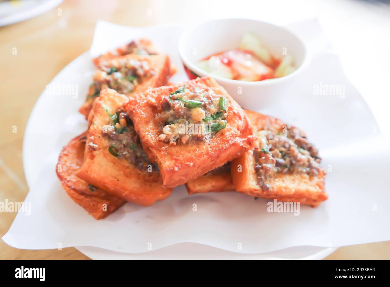 fried bread with minced pork spread, deep fried bread with pork topping ...