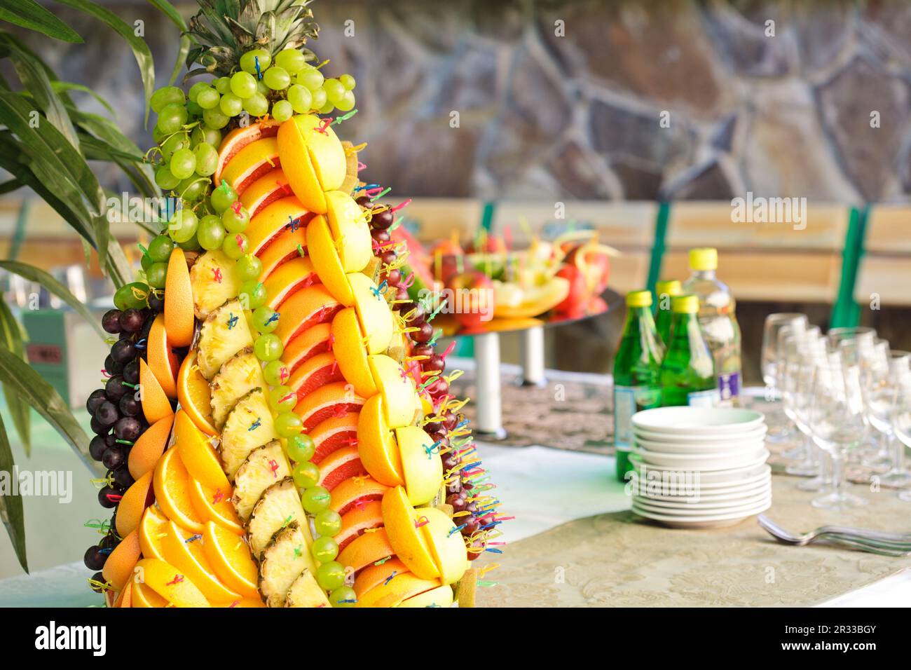 Fruits on silver stand Stock Photo - Alamy