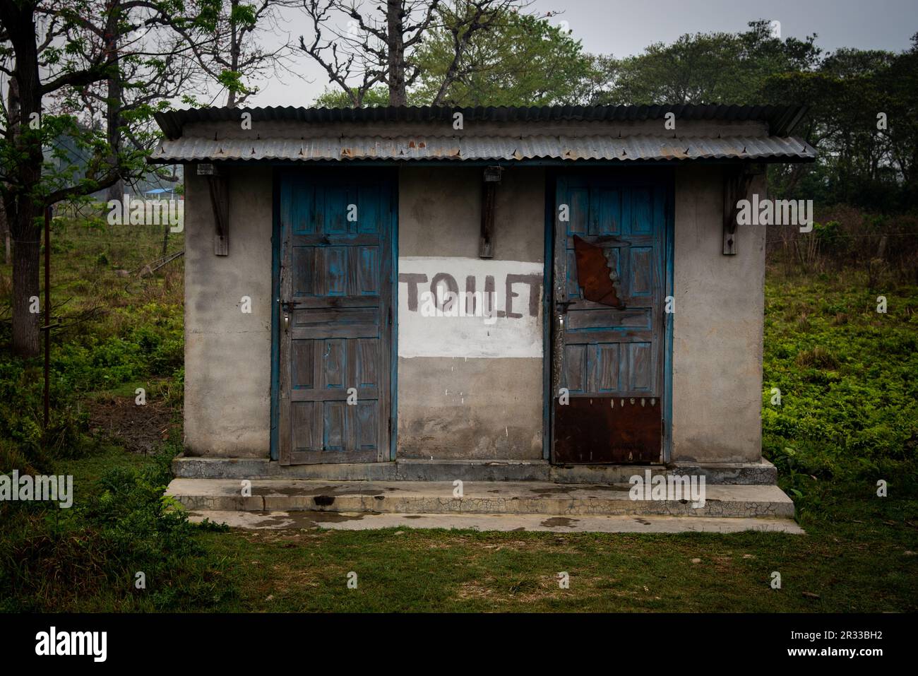 Old public toilet outdoors in nature. Restroom in camp Stock Photo - Alamy