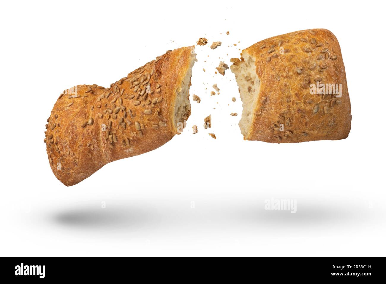 Loaf of crispy bread isolated on white. A loaf of freshly baked crispy ...