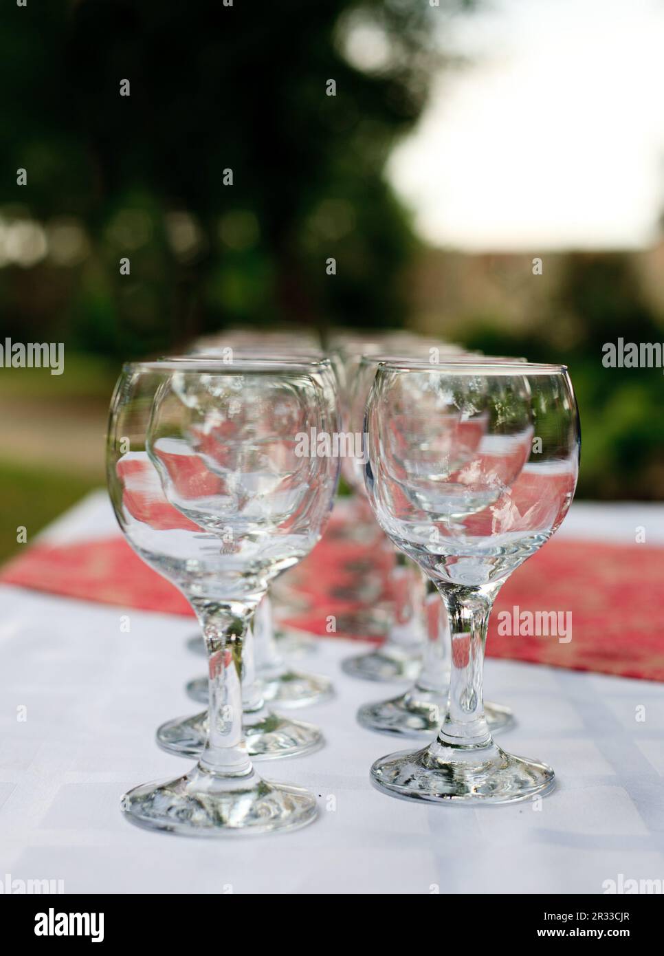 Glasses in rows outdoors Stock Photo - Alamy
