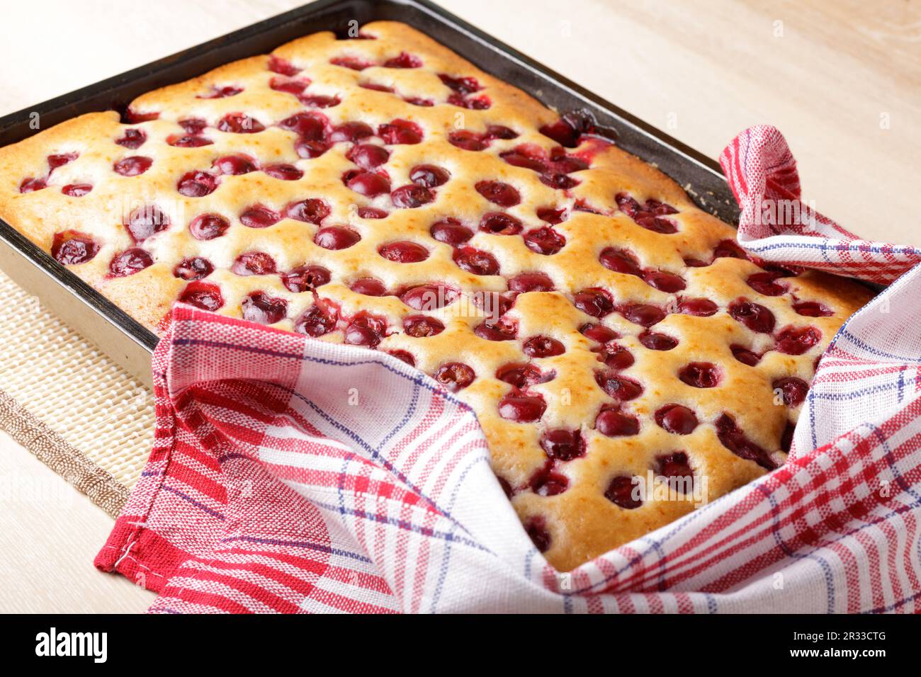 Cherry sponge cake Stock Photo - Alamy