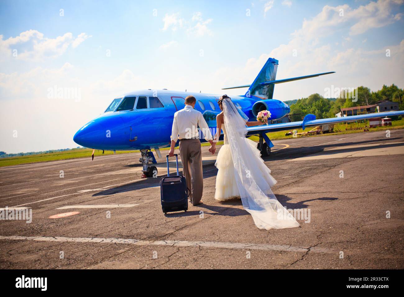Couple airplane honeymoon hi-res stock photography and images - Alamy