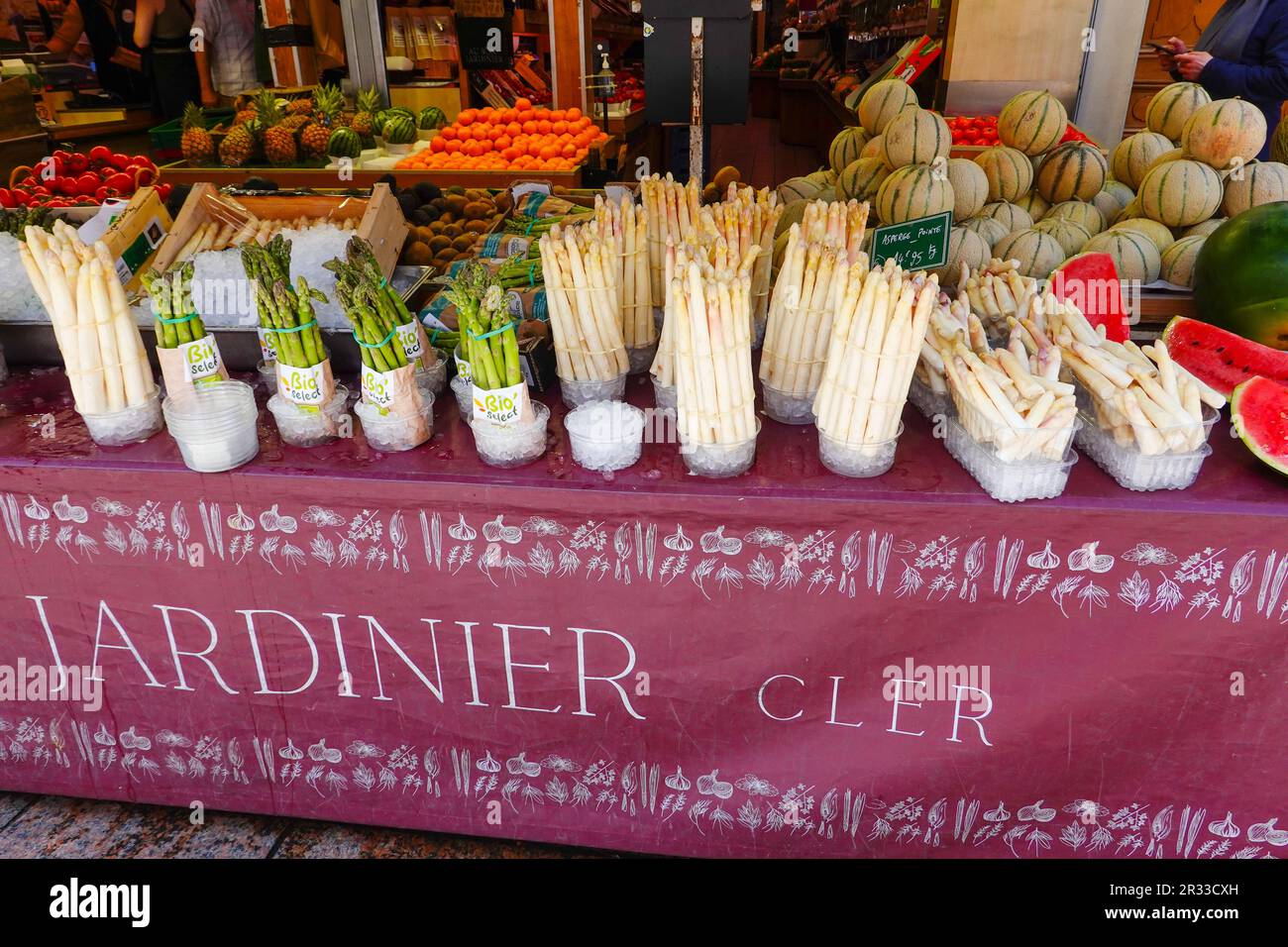 White and green asparagus attractively displayed outside a market on ...